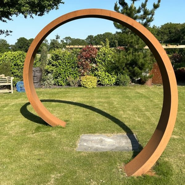 Corten Steel Helix Moongate Arch – Lateral Design Studio